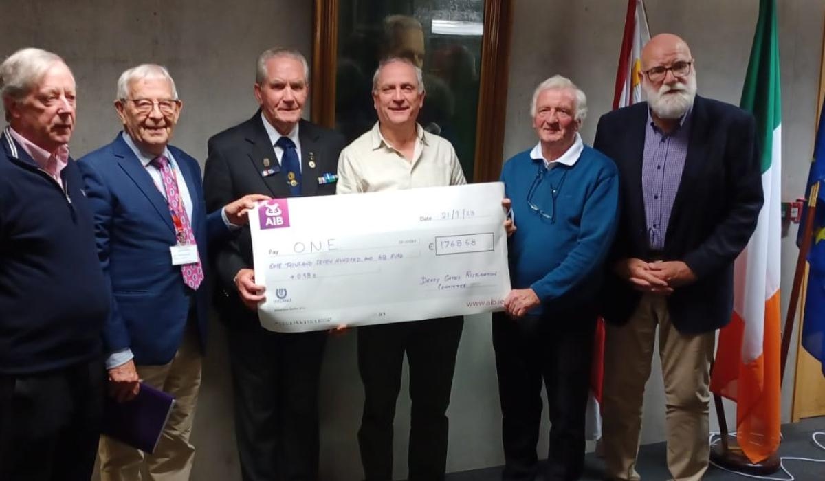 Cheque presentation following 25th anniversary event at Devoy Barracks ...
