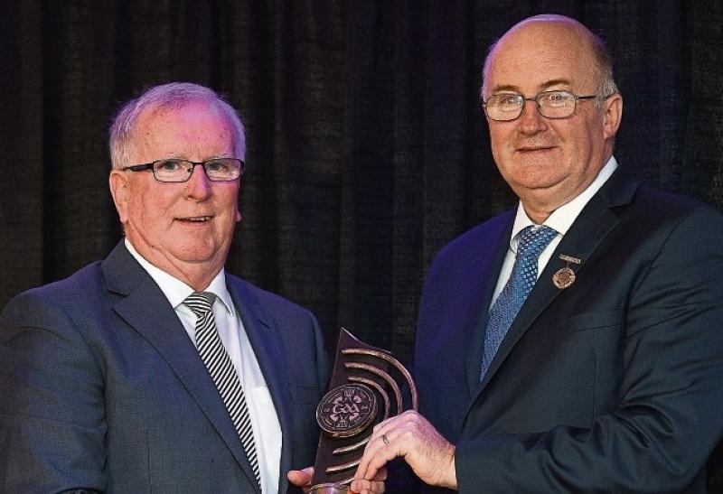 The Leinster Leader’s Tommy Callaghan is presented with top national ...
